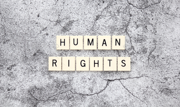 Human Rights word tiles on a cracked concrete background Stock Photo by ...