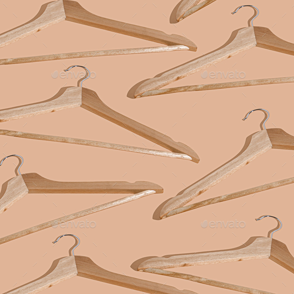 Pattern hangers for clothes. Hanger set. Beige background copy space ...