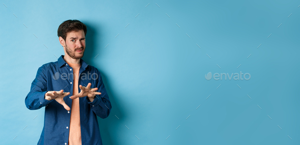 Guy cringe from something awful and nasty, refusing from bad ofer ...