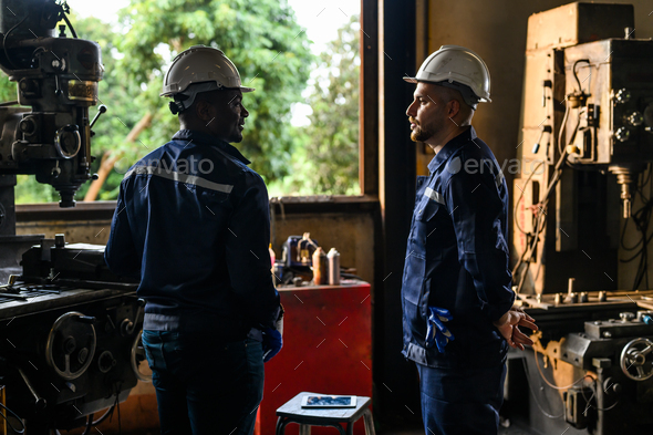 Professional mechanical engineer team checking and repairing engine ...