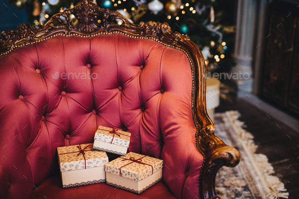 Horizontal picture of wrapped three gift boxes on beautiful royal ...