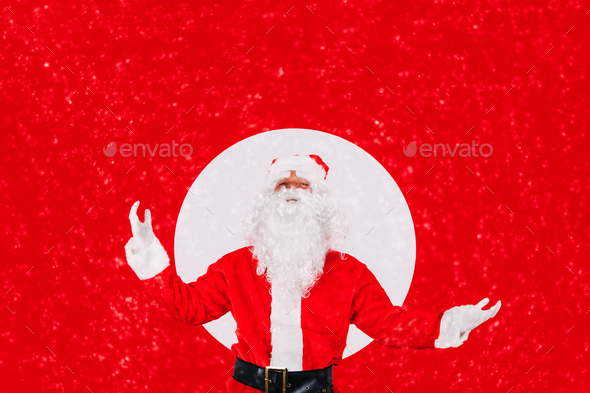 Santa Claus spreads his arms happy as snowflakes fall Stock Photo by ...