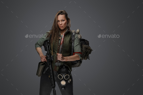 Bandit woman with bloody knife in post apocalyptic setting Stock Photo ...
