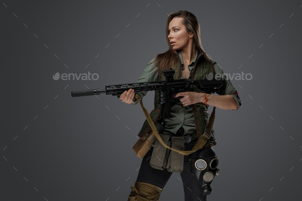 Attacking female mercenary in setting of post apocalypse Stock Photo by ...