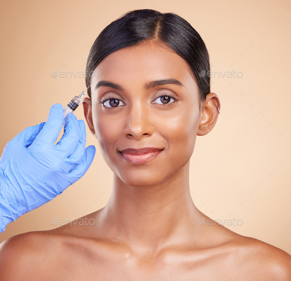 Portrait, smile or Indian woman with injection for botox, plastic ...