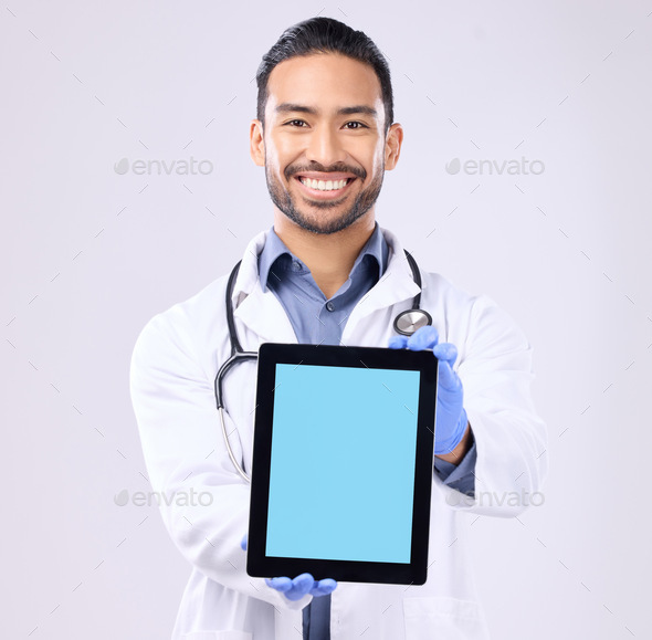 Tablet mockup and doctor portrait isolated on a white background ...