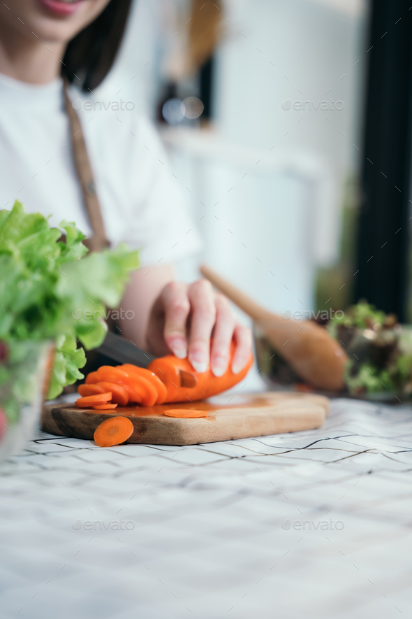 cooking healthy food from fresh vegetables and fruits in kitchen room ...