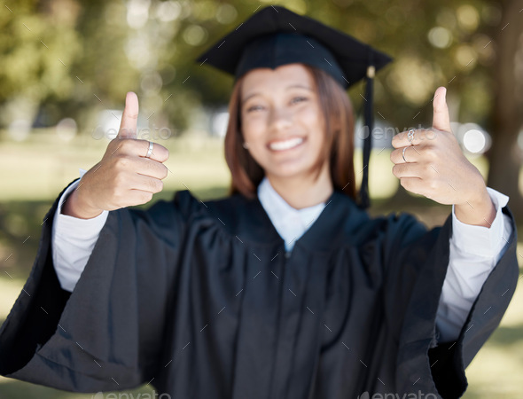 University, graduation and student with thumbs up for success, award ...