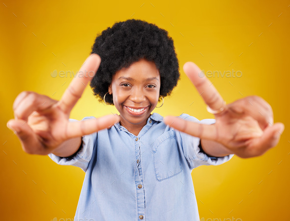 Happy, peace sign and portrait of a black woman in studio with a ...