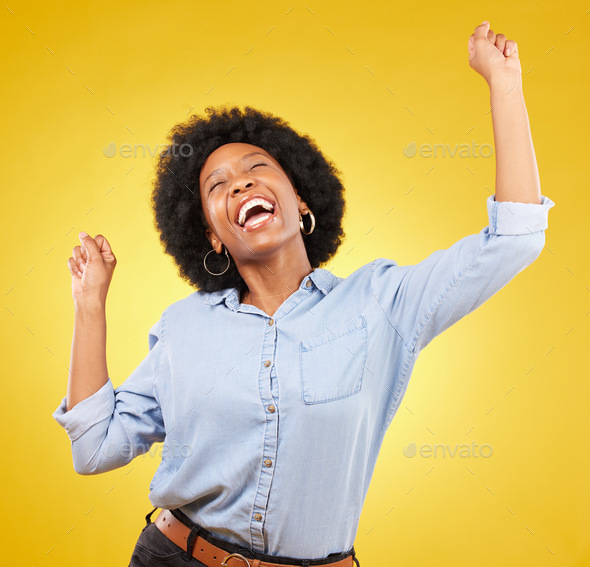 Happy, cheering and excited black woman with freedom isolated on a ...