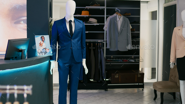 Empty clothing store for modern people and clients Stock Photo by DC_Studio