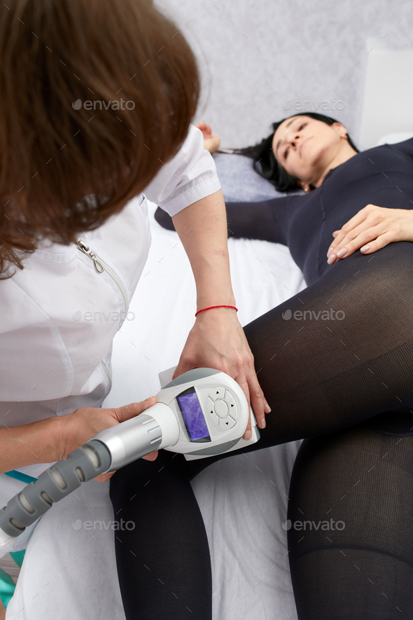 LPG machine massage for lifting body. Woman getting beauty therapy against cellulite in spa ...