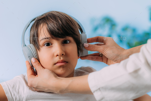 Boy Having Pure Tone Audiometry Test at Audiology Office. Stock Photo ...