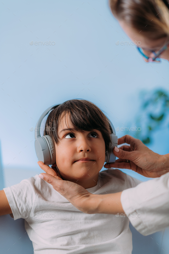 Boy Having Pure Tone Audiometry Test at Audiology Office. Stock Photo ...