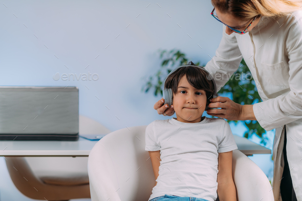 Boy Having Pure Tone Audiometry Test at Audiology Office. Stock Photo ...