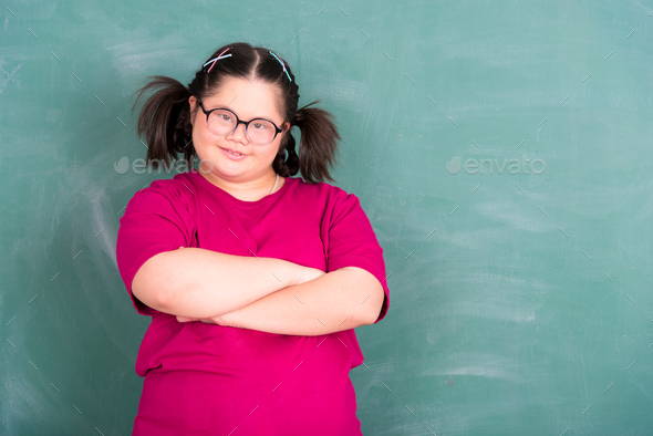 Young Asian autism disabled kid in happy and smile emotion in front of ...