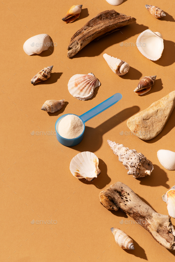 Calcium or collagen powder with natural materials Stock Photo by denira21