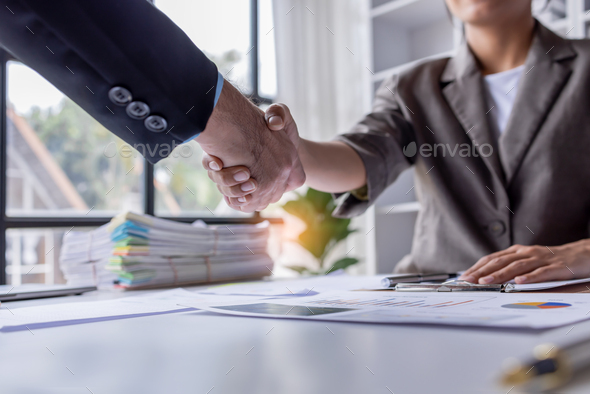 Handshake of businesspeople. Female and male hand makes a handshake in ...