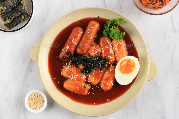 Topokki or Tteokbokki is Stir-fried Rice Cake with Vegetables and Fish ...
