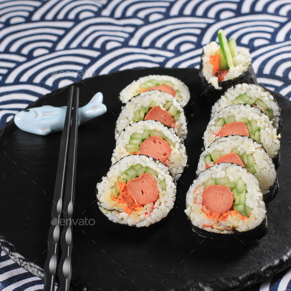 Korean Roll Gimbap (Kimbob or Kimbap) made from Steamed White Rice (Bap ...