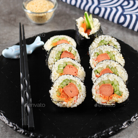 Korean Roll Gimbap (Kimbob or Kimbap) made from Steamed White Rice (Bap ...