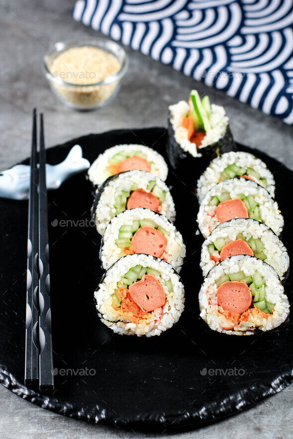 Korean Roll Gimbap (Kimbob or Kimbap) made from Steamed White Rice (Bap ...
