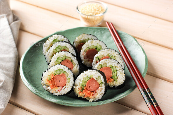Korean Roll Gimbap (Kimbob or Kimbap) made from Steamed White Rice (Bap ...