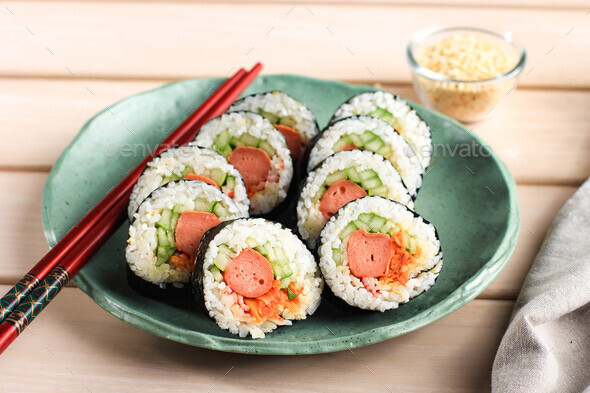 Korean Roll Gimbap (Kimbob or Kimbap) made from Steamed White Rice (Bap ...