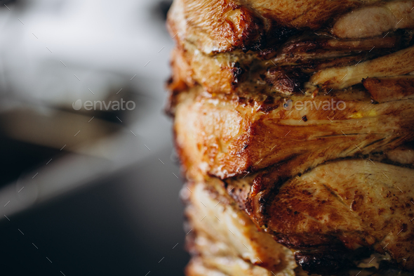Shawarma. Closeup picture of stacked meat roasting, shawarma Stock ...