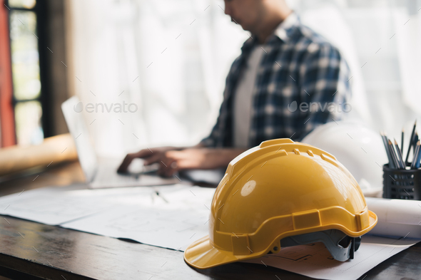 Close up view of Architect sketching a construction project on his ...