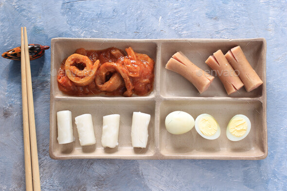 Topokki or Tteokbokki is Stir-fried Rice Cake with Vegetables and Fish ...