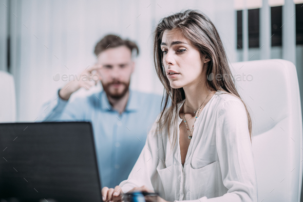 Mobbing at Work. Scared Female Employee in the Modern Office Stock ...