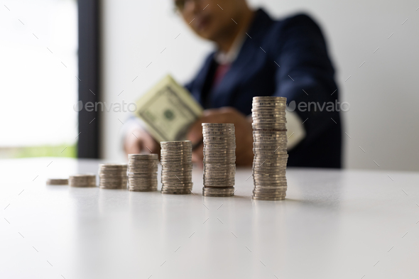 Investment and Wealth Savings Concept. Wealthy businessmen own more ...