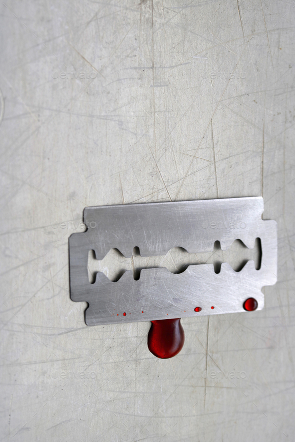 Razor blade with blood Stock Photo by westend61 | PhotoDune