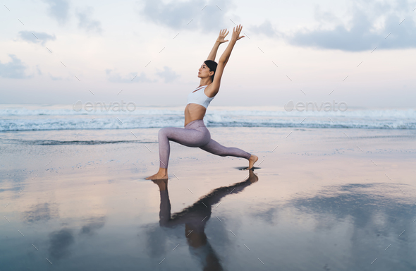 Attractive female reaching healthy lifestyle while meditate and breath ...