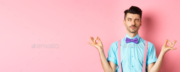 Funny guy with moustache and bow-tie fake meditating, peeking aside ...