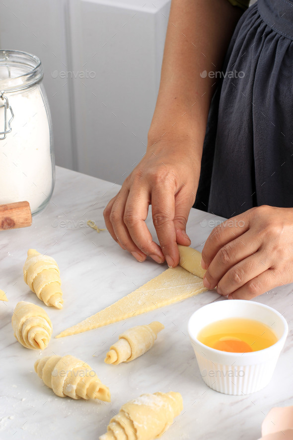 Female Hand Rolling Dough into Rolls, Baking Process Making Croissant ...