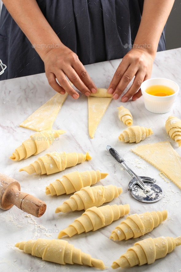 Female Hand Rolling Dough into Rolls, Baking Process Making Croissant ...