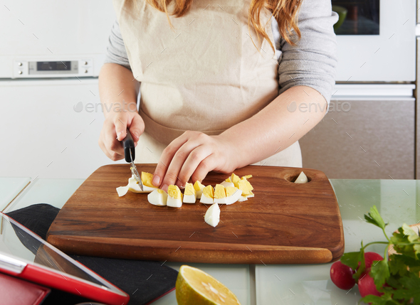 Tween cooking according the tutorial of online virtual master class Stock Photo by foodphotoalex