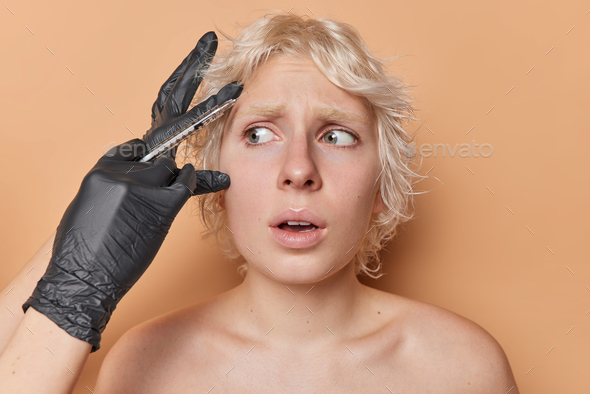 Plastic surgery and skin rejuvenation concept. Blonde female model ...