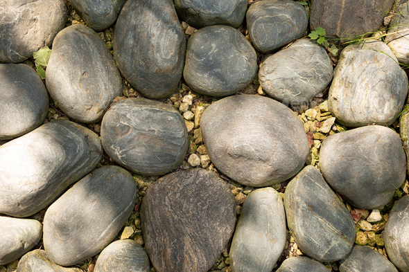 Background image large smooth stones Stock Photo by natalya_ugr | PhotoDune