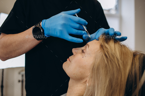 Hyaluronic acid injection for facial rejuvenation procedure Stock Photo ...