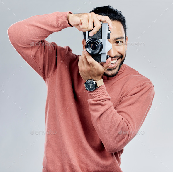 Man with camera, photography in portrait with smile, taking picture ...