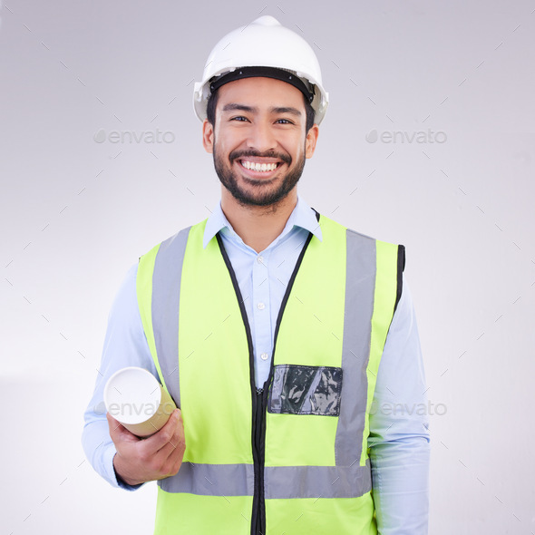 Construction worker man in portrait isolated on a white background ...