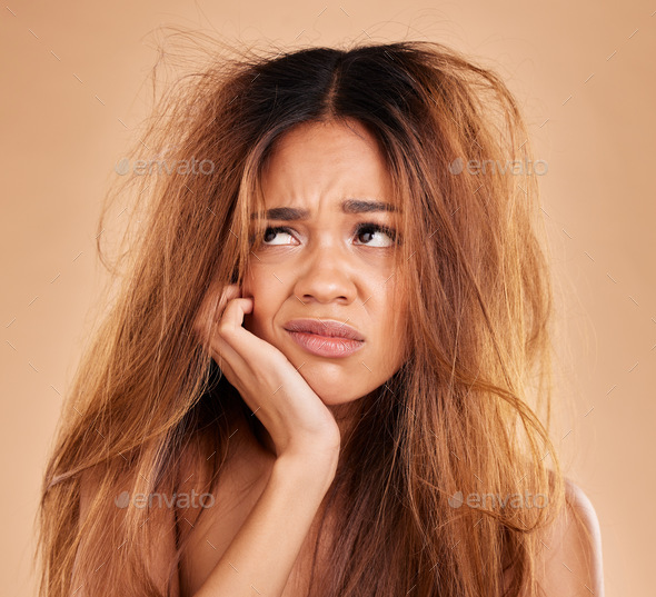Sad face, hair loss and woman in studio isolated on a brown background ...