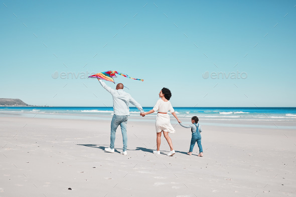 Holding hands, travel and family walking with kite together at a beach ...