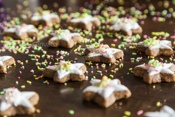Cinnamon stars with coloured sugar granules Stock Photo by westend61
