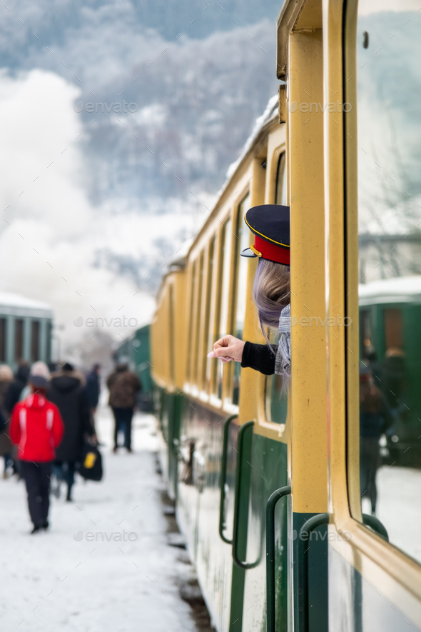 Moving steam train Mocanita from inside it in winter, Romania Stock ...