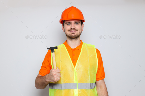 Young man civil engineer in safety hat Stock Photo by AtlasComposer