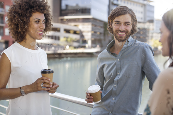 Urban business people taking a break, talking togehter Stock Photo by ...